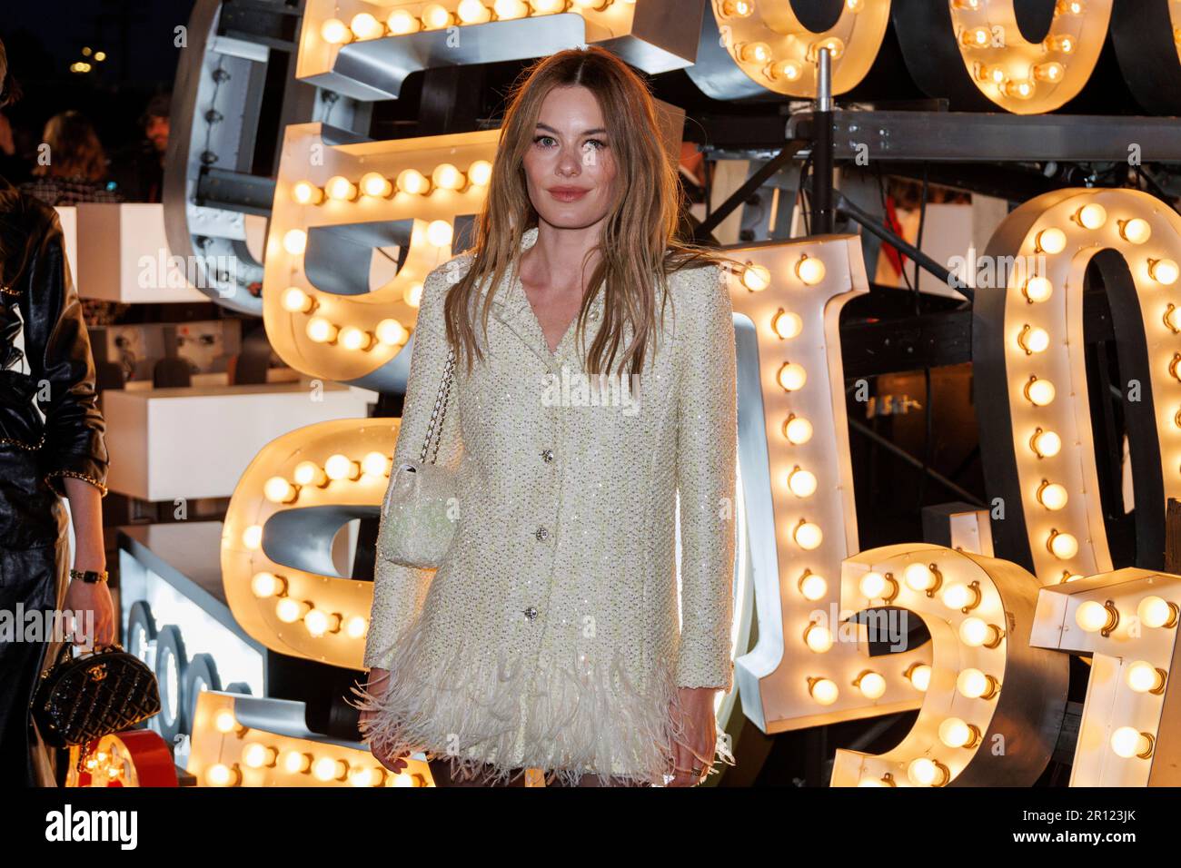 Camille Rowe arrives at the Chanel Cruise 2022/2023 Fashion Show on ...