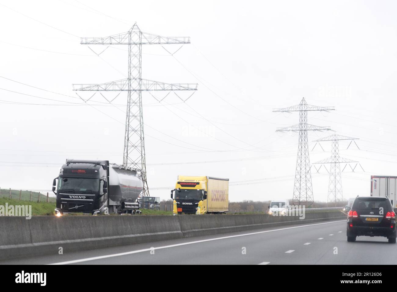 High voltage power lines over Bundesautobahn 2 in North Rhine-Westphalia, Germany © Wojciech ...