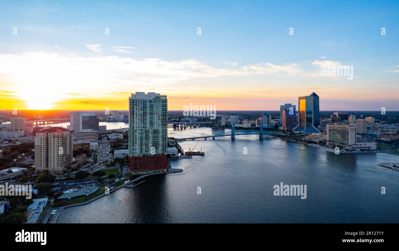 The evening sky is illuminated by the grand skyline of Jacksonville ...