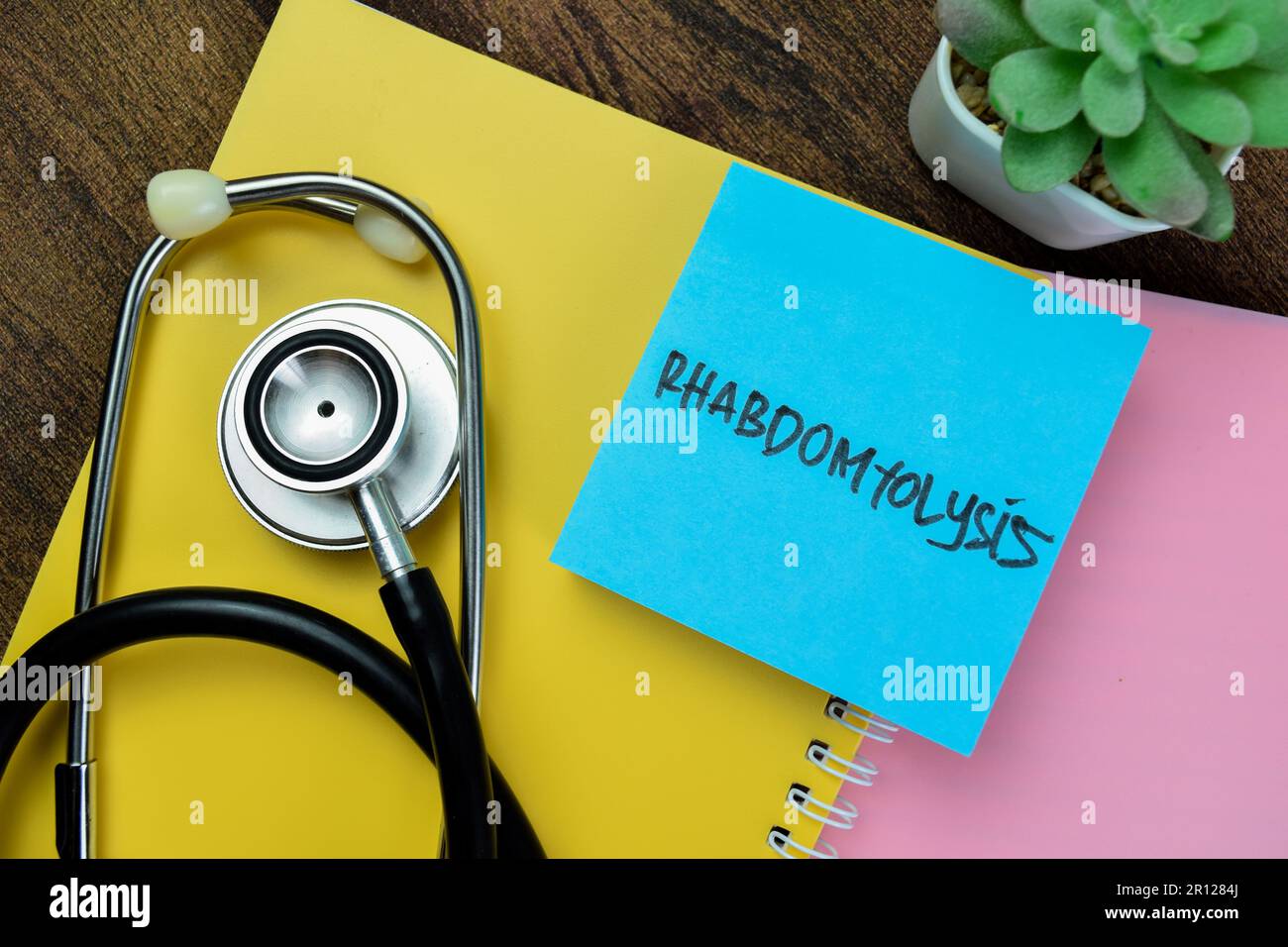 Concept of Rhabdomyolysis write on sticky notes with stethoscope ...