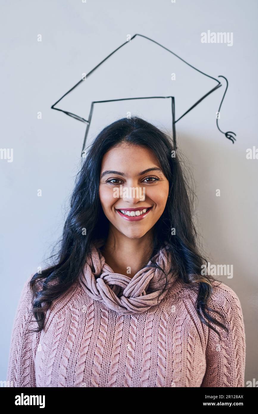 Im almost there. a young university student standing against a ...