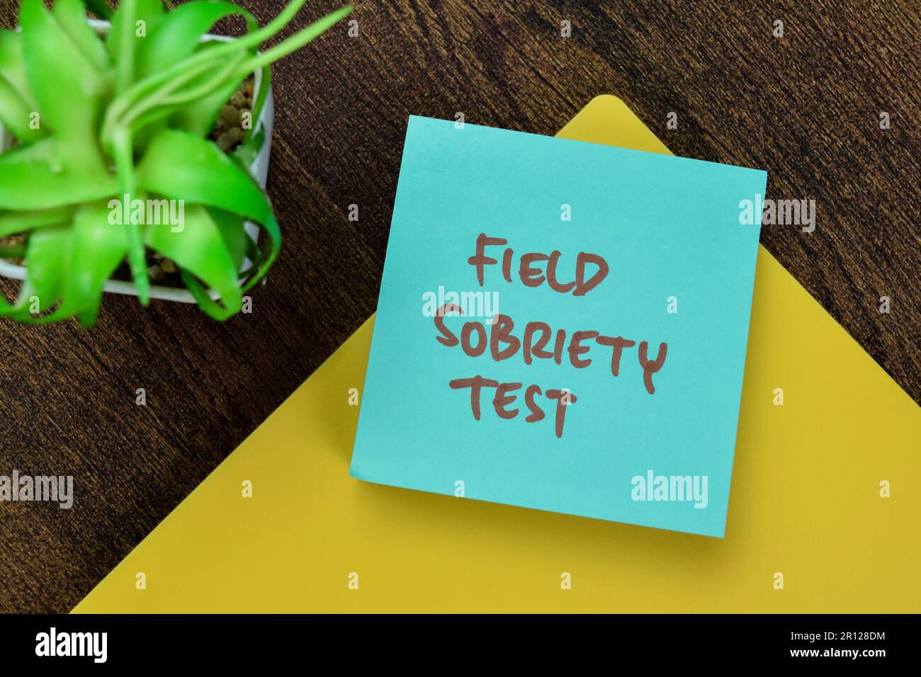 Concept of Field Sobriety Test write on sticky notes isolated on Wooden ...