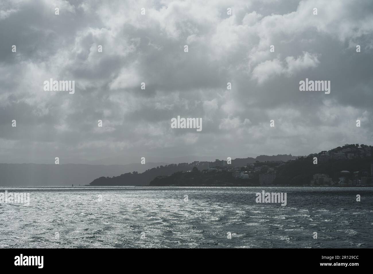 A breathtaking view of the ocean, with several boats sailing in the ...