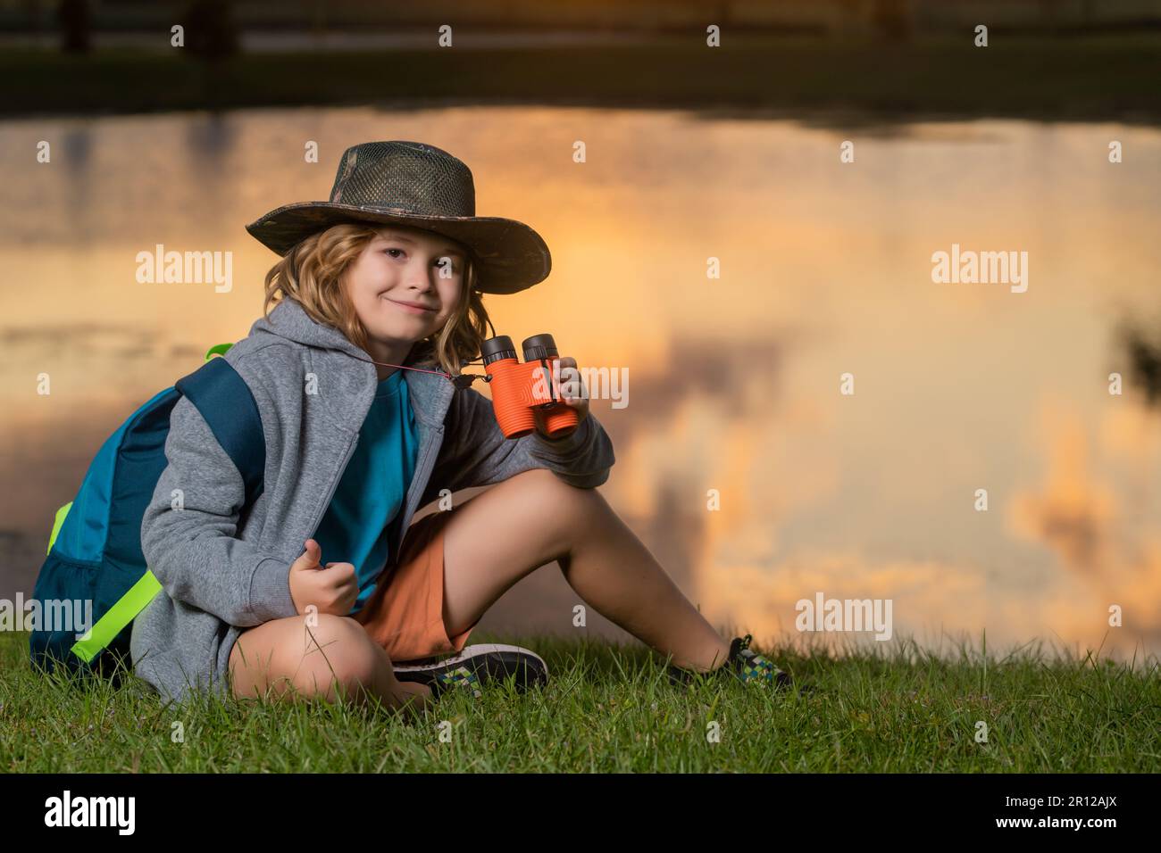 Traveler tourist kid. Scout boy wearing explorer hat and backpack ...
