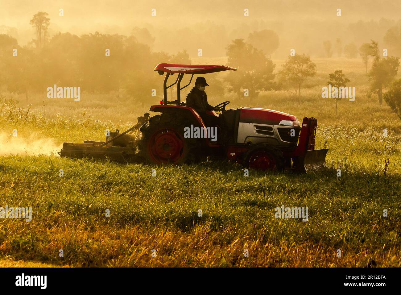 Working on tractor lawn mower hi-res stock photography and images - Alamy