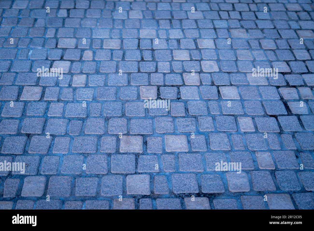 Cobblestone pavement texture background Stock Photo - Alamy