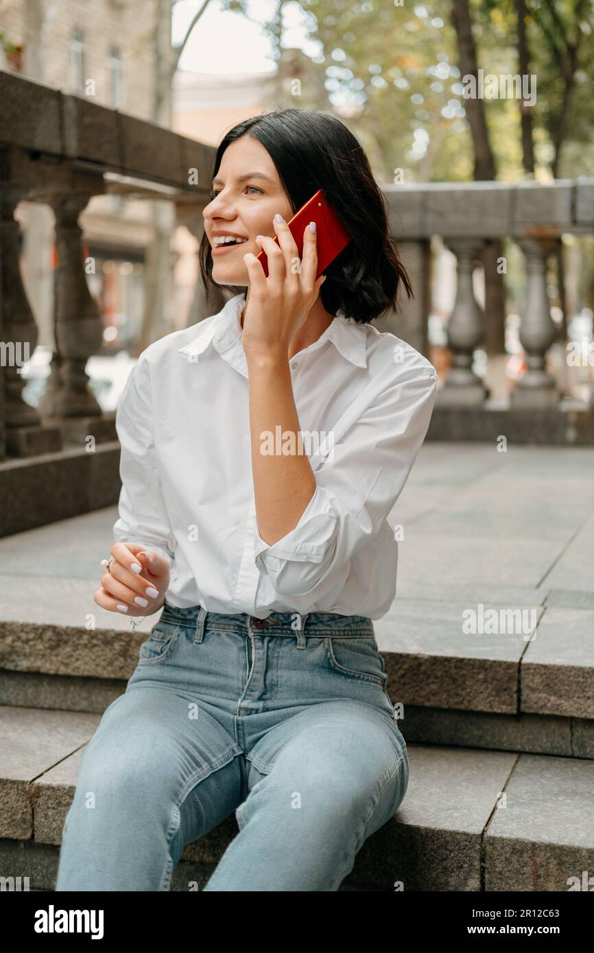 Woman calling up stairs hi-res stock photography and images - Alamy