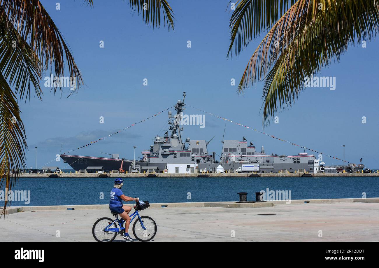 Key West, United States. 10th May, 2023. A woman rides a bicycle in ...