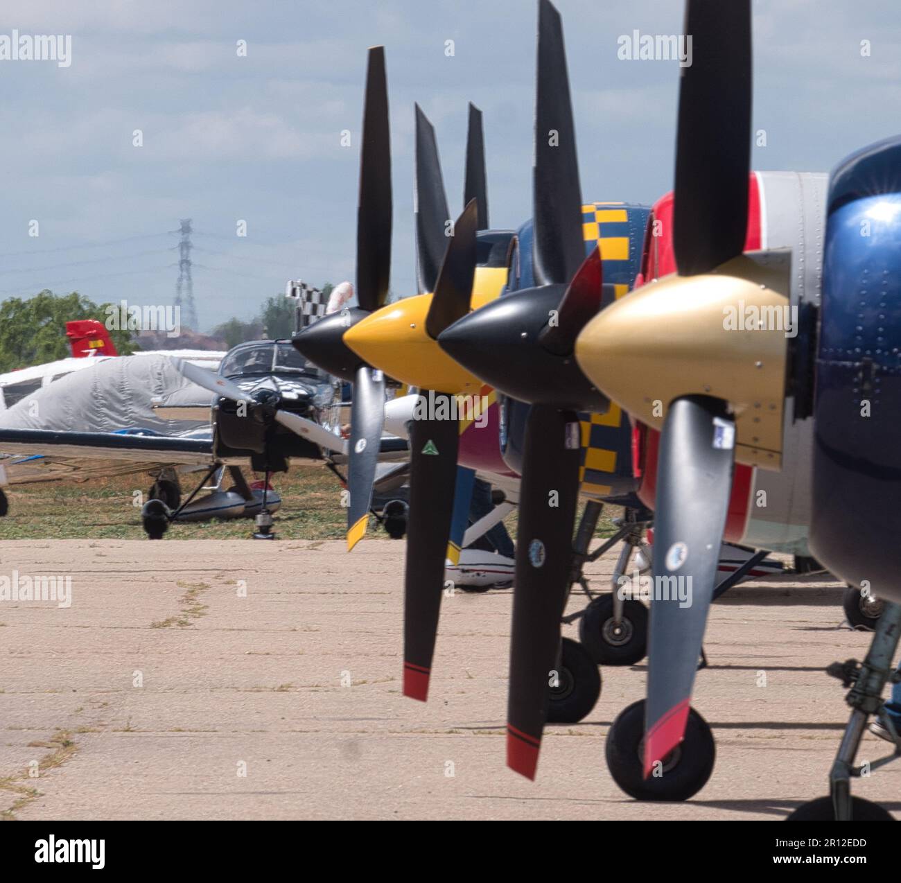 A close up image of a parked airplane's front propeller, showing the ...
