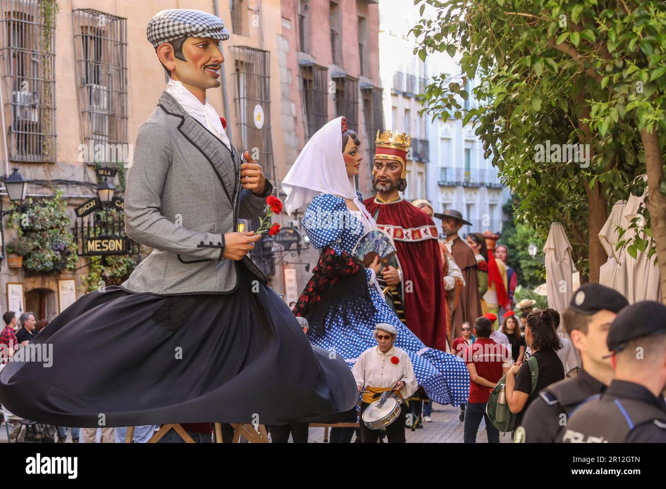 Madrid, Spain. 10th May, 2023. Giants and big heads tour the streets of ...