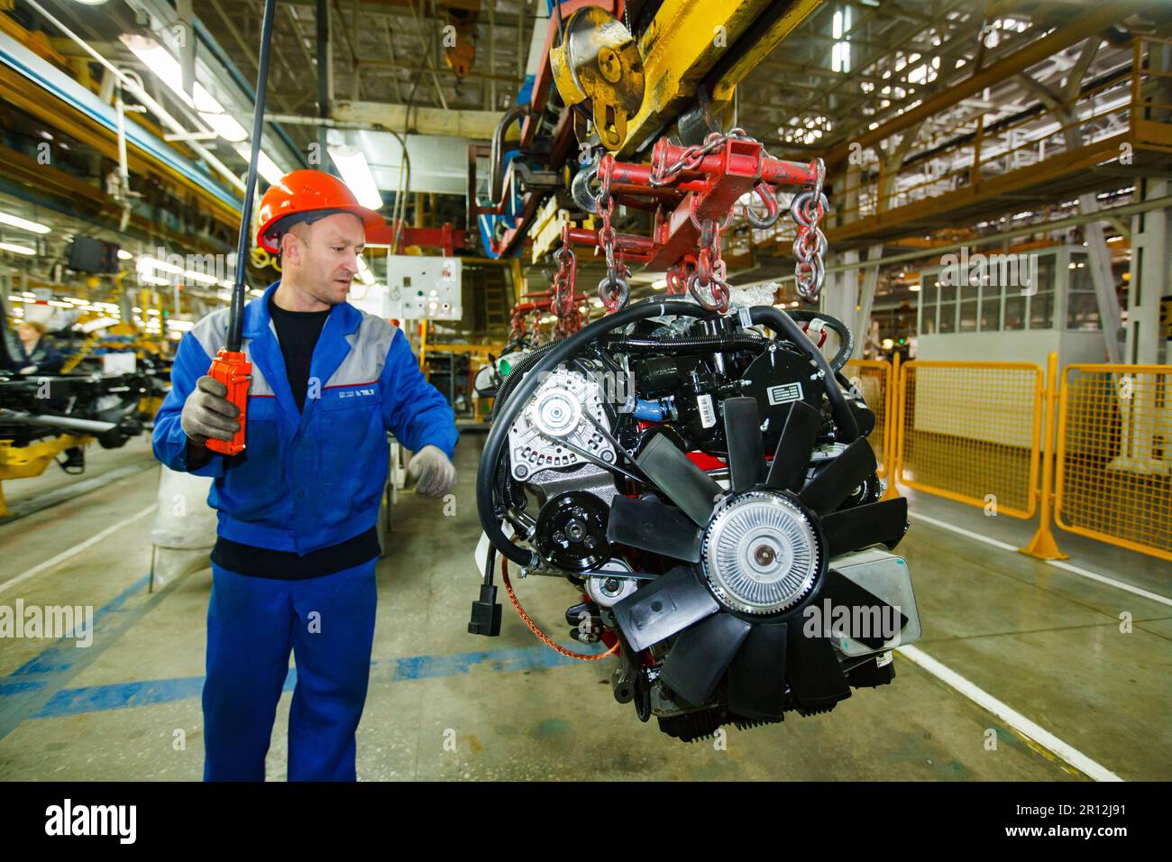 Production worker helmet hi-res stock photography and images - Alamy