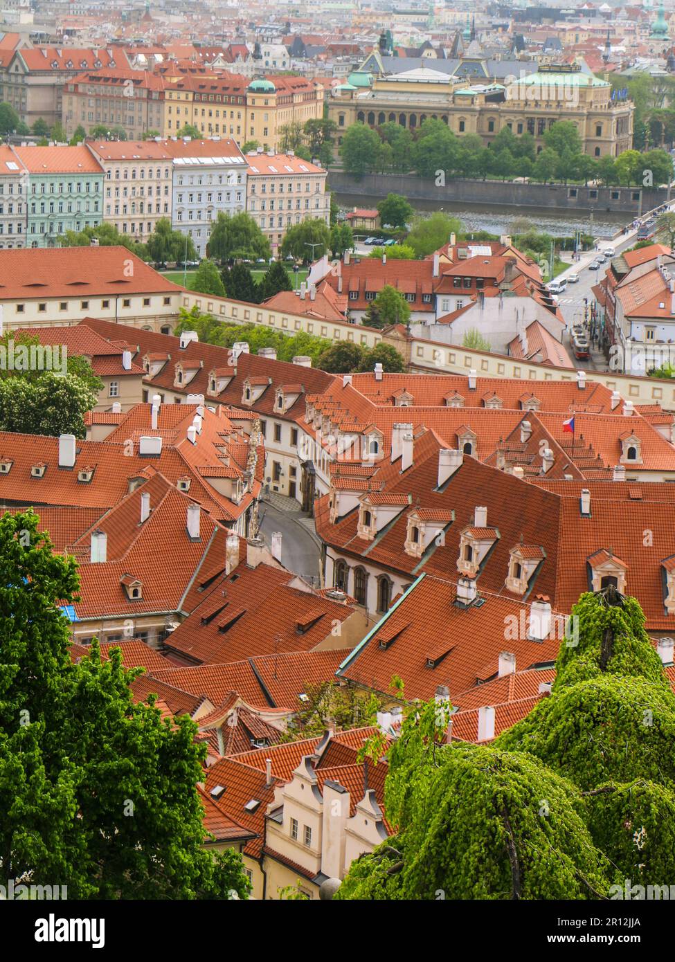An aerial view of a quaint small town with a row of tall buildings and ...