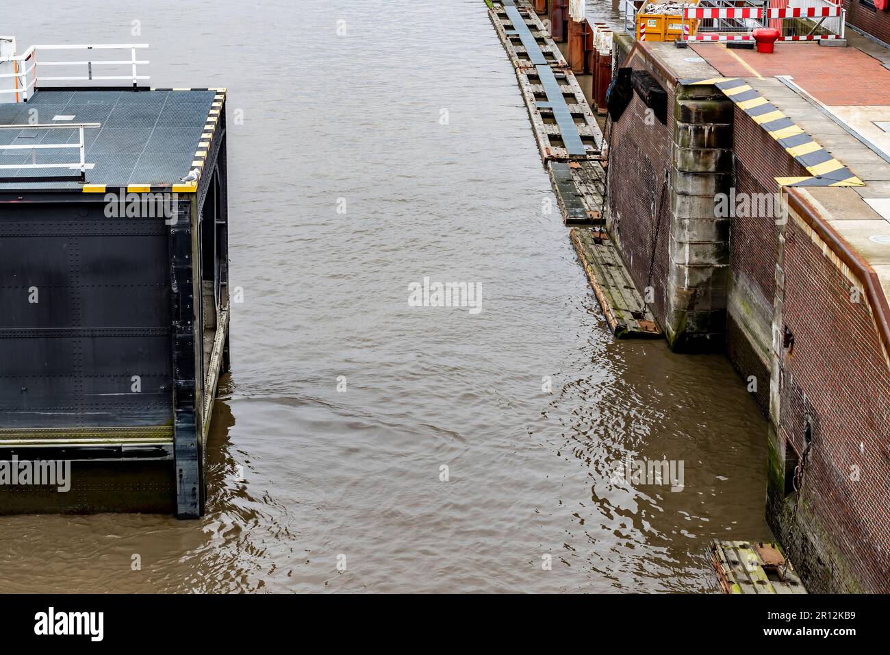 The Lock gates closing after entering the Brunsbuttel lock on leaving ...