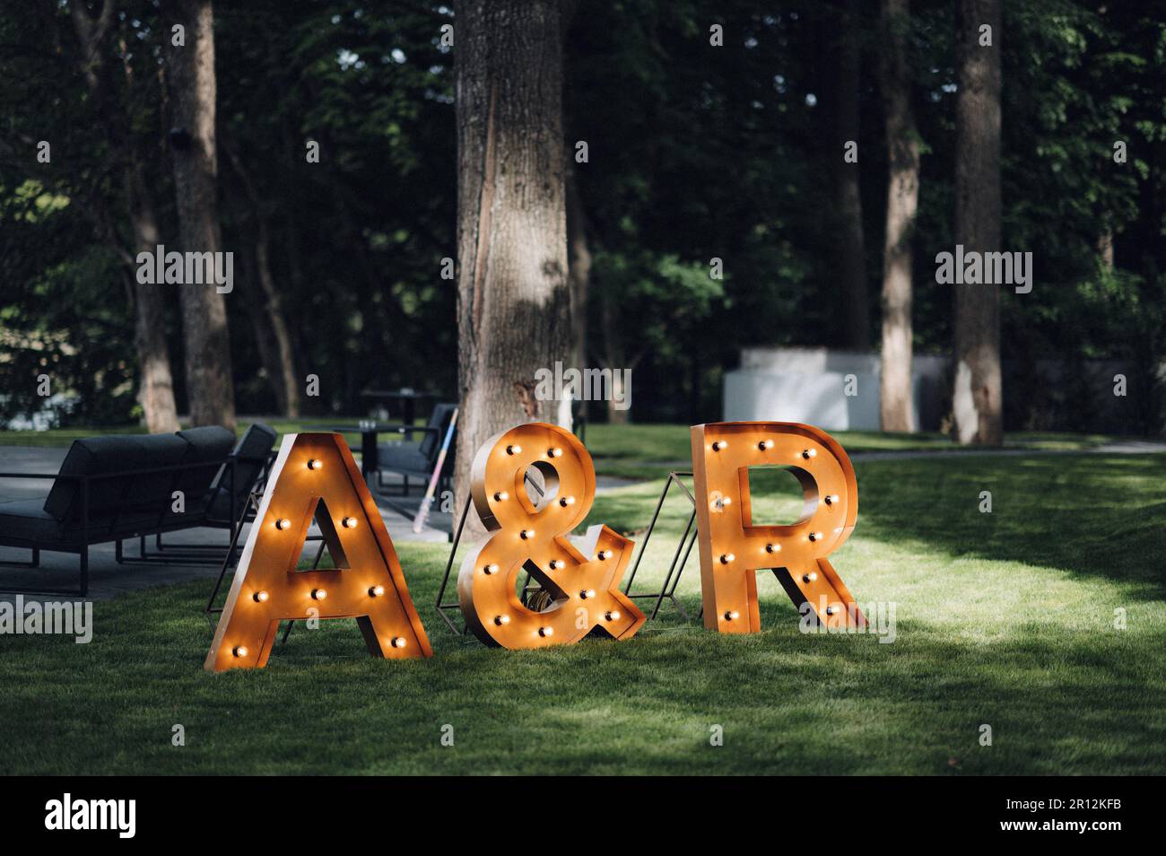 The A and R letters in a grassy meadow. Wedding concept Stock Photo - Alamy