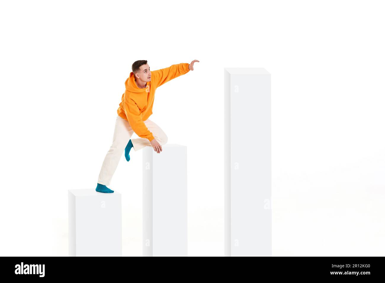 man rising up the career ladder. guy following up on white diagram ...