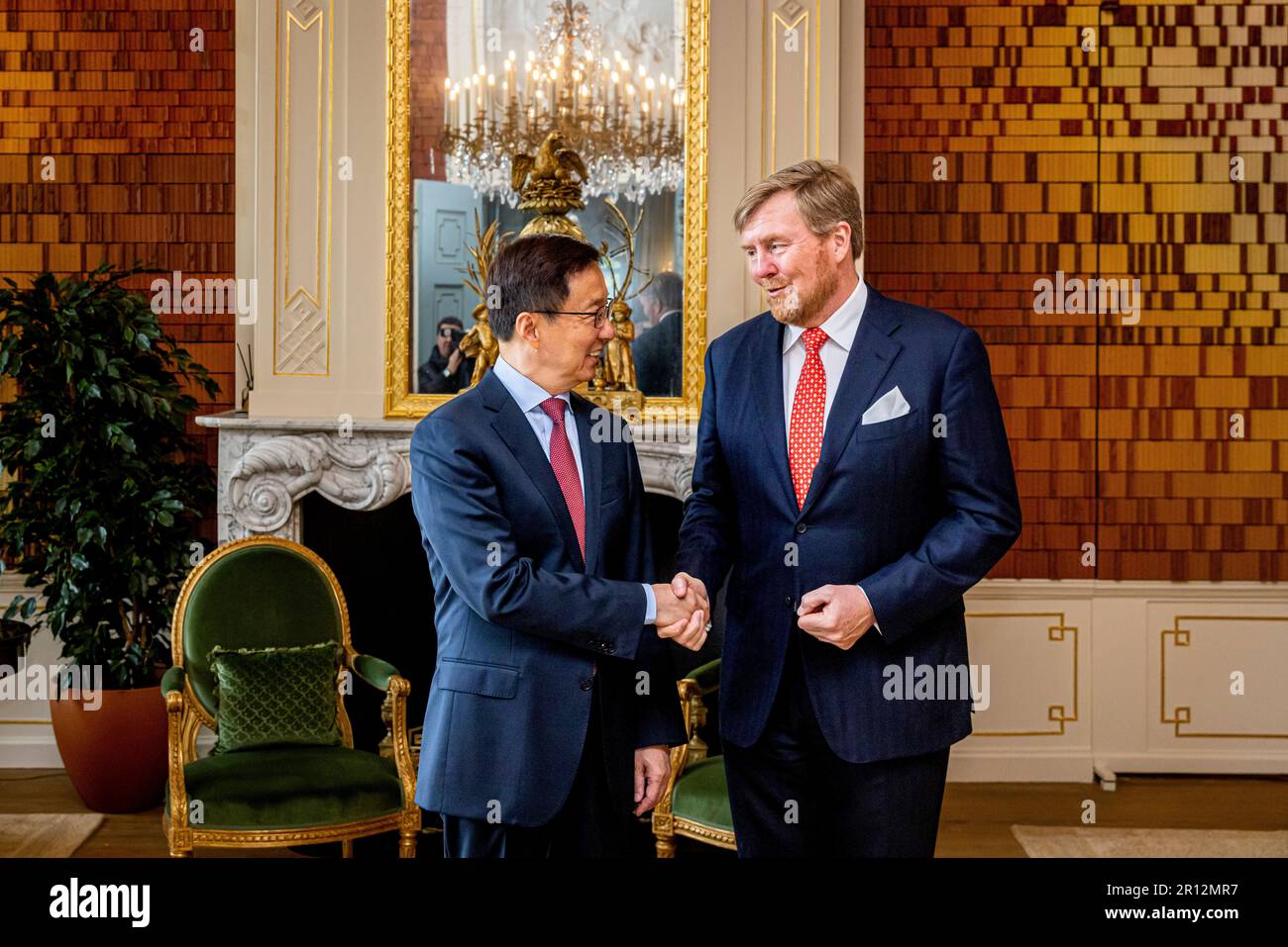 Chinese Vice Premier Han Zheng, left, poses with Dutch King Willem-Alexander prior to a meeting ...