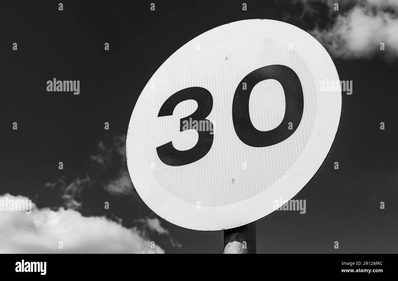 Speed sign, faded in black and white Stock Photo - Alamy