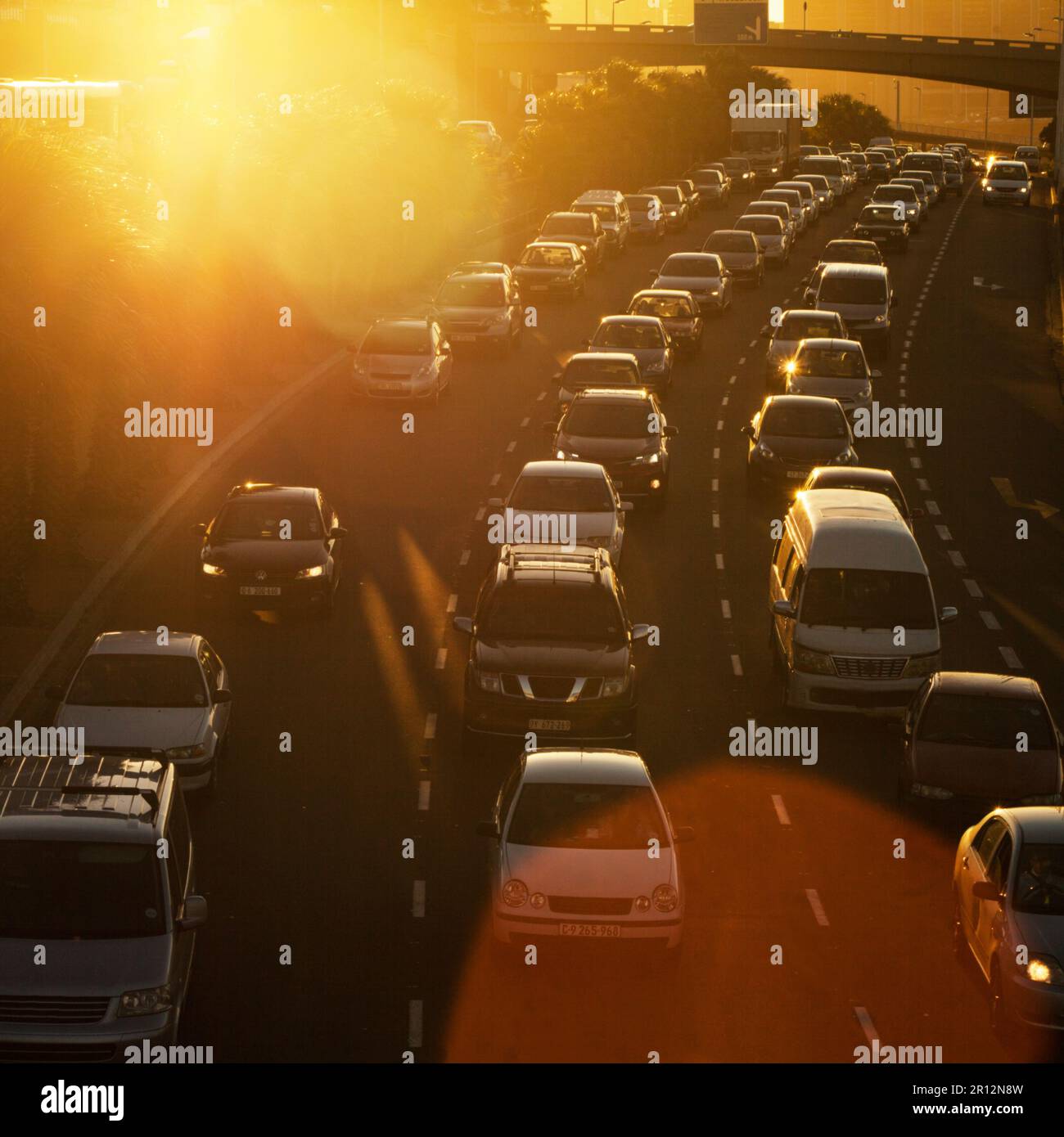 Traffic jam, sunset and highway with cars in road for transportation ...