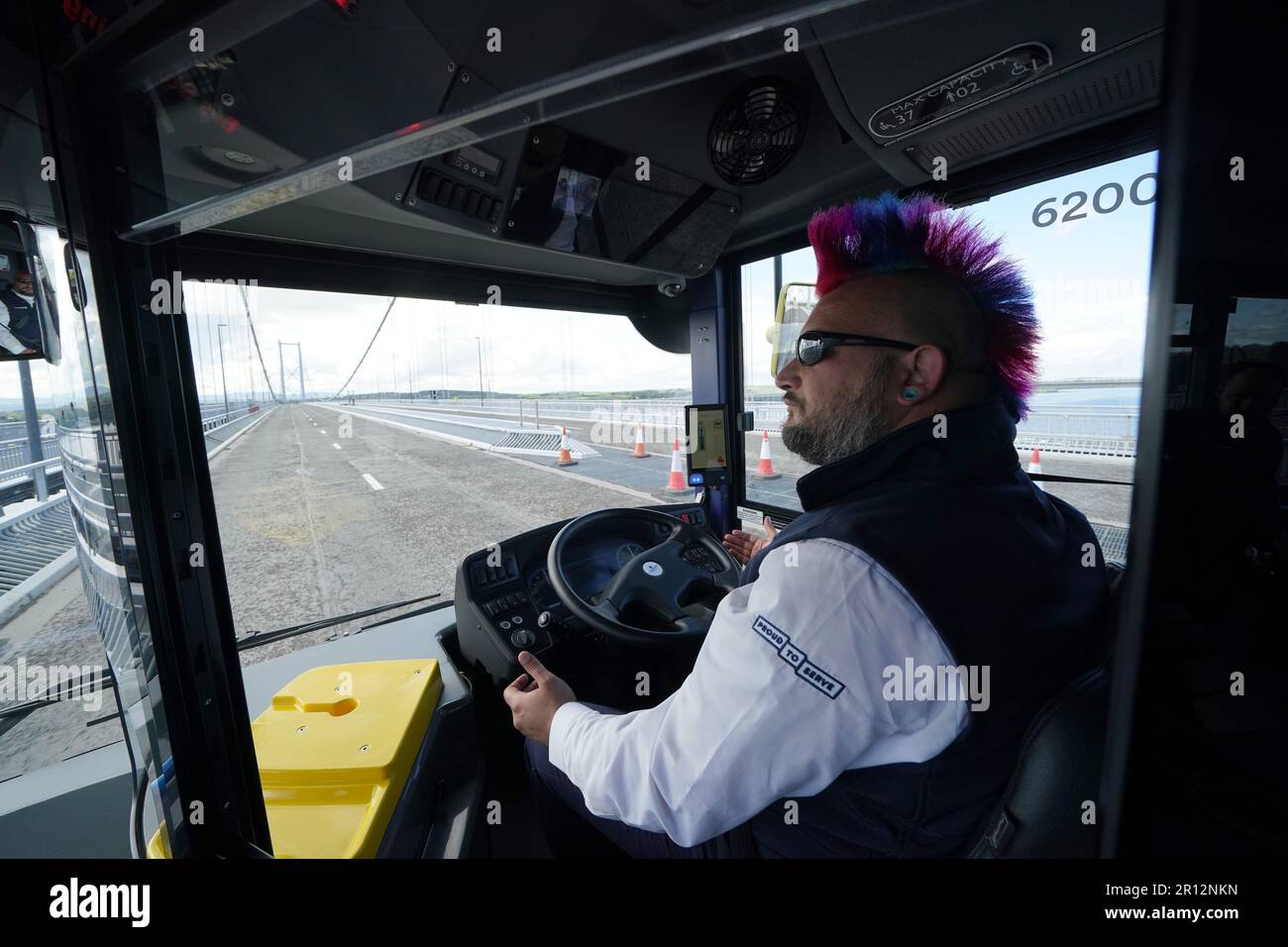 Stuart Doidge sits in the drivers seat with no hands on the wheel on ...