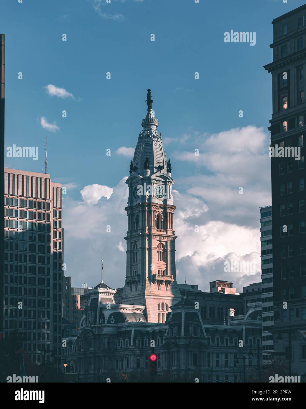 A classic church steeple with its spire jutting above the skyline of a ...