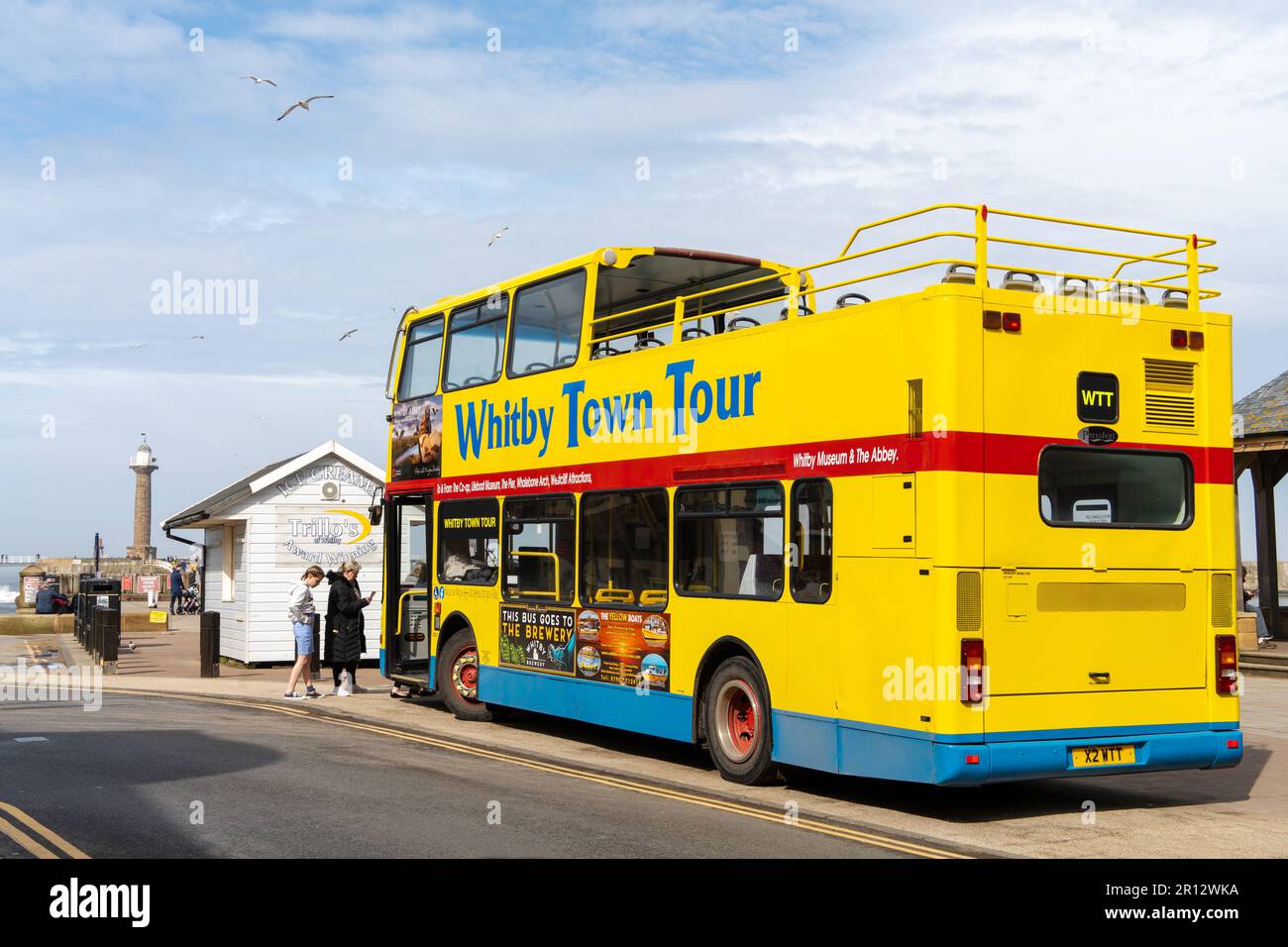 The yellow Whitby Town Tours open top bus, to take visitors around the ...