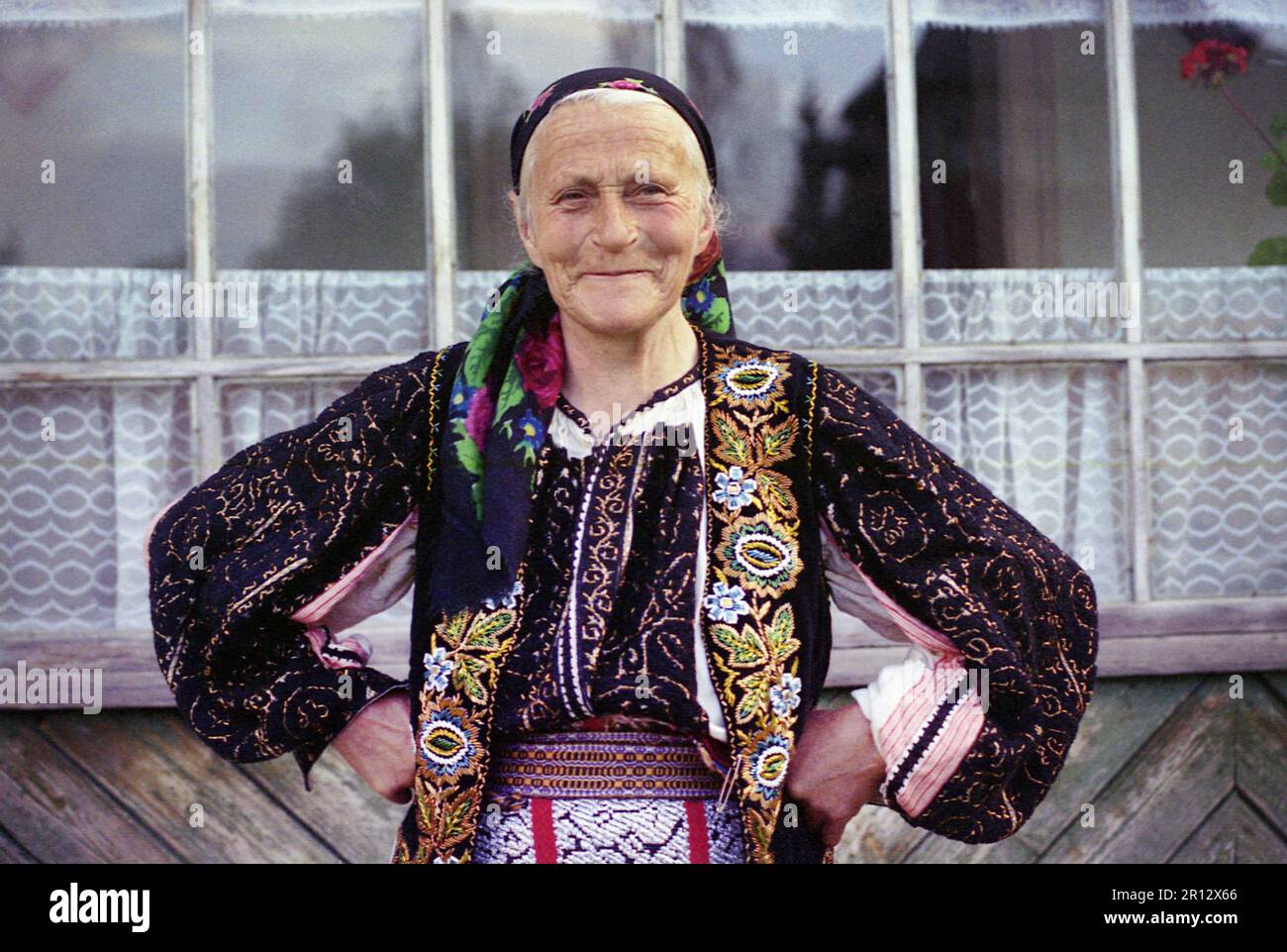 Sirnea, Brasov County, Romania, approx. 2000. Local woman wearing a ...