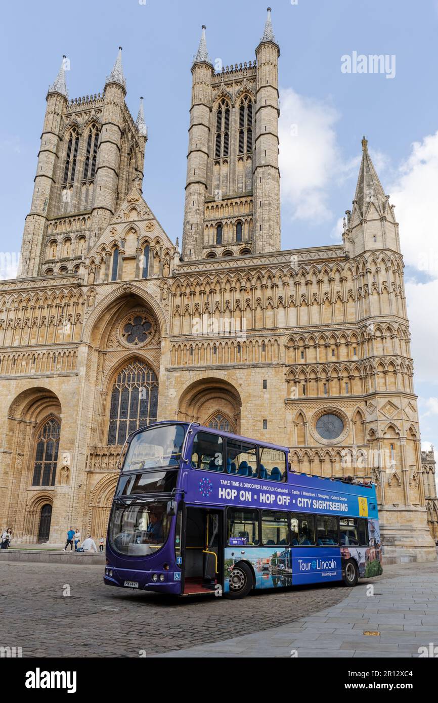 The 'hop on hop off' city tour bus outside Lincoln Cathedral in the ...