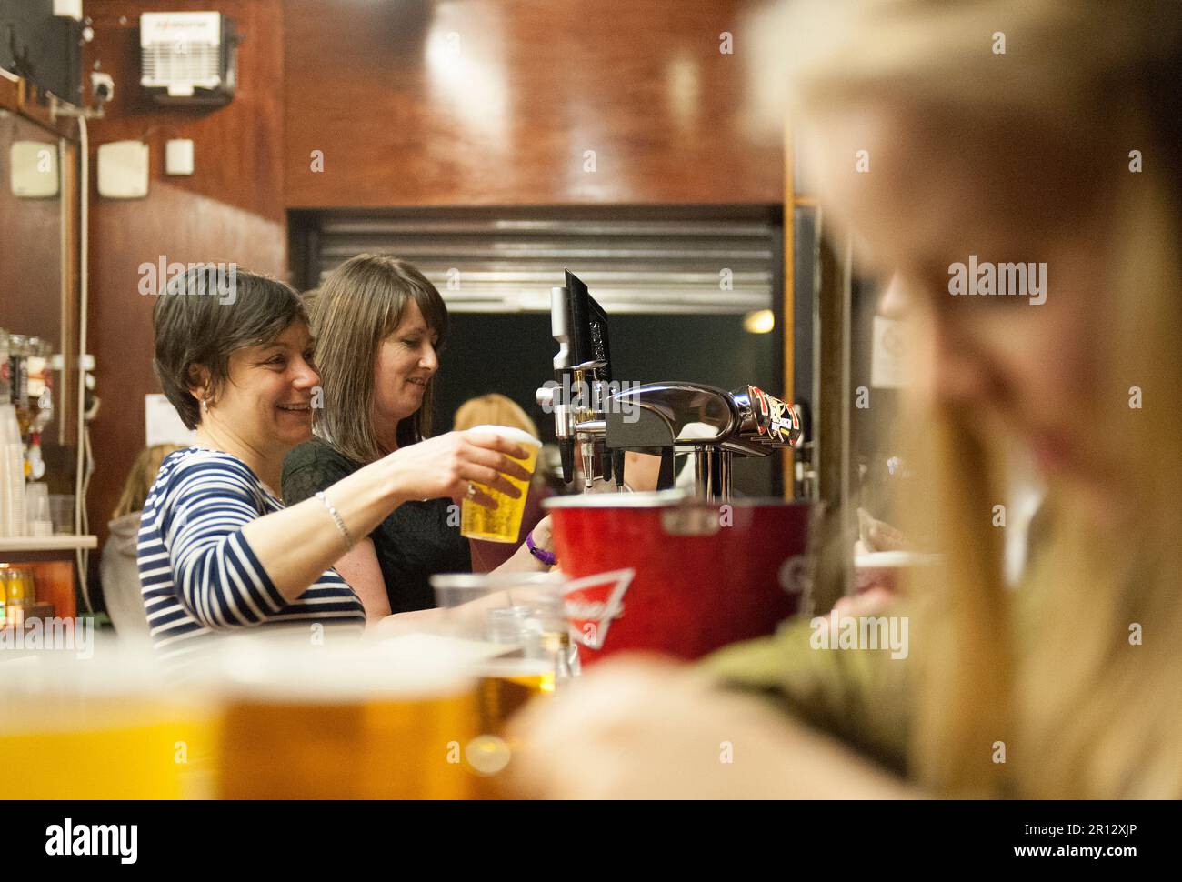 The crowd queue up at the bar at a Specials AKA gig at the iconic ...