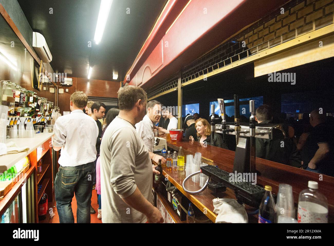 The crowd queue up at the bar at a Specials AKA gig at the iconic ...