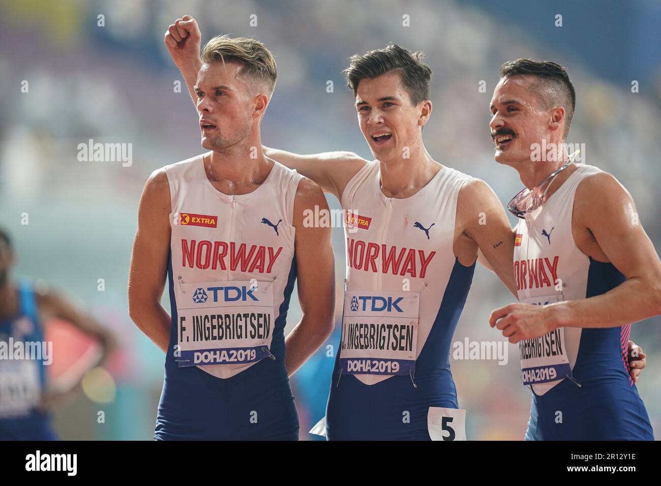 Jakob Ingebrigtsen running with his brothers in the 5000 meters at the 2019 World Championships ...