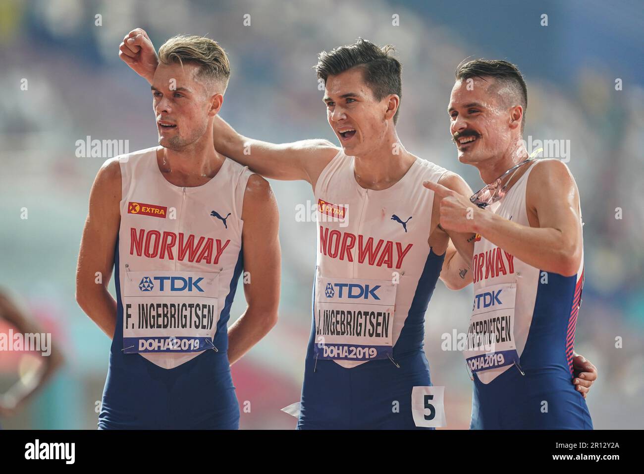 Jakob Ingebrigtsen running with his brothers in the 5000 meters at the 2019 World Championships ...