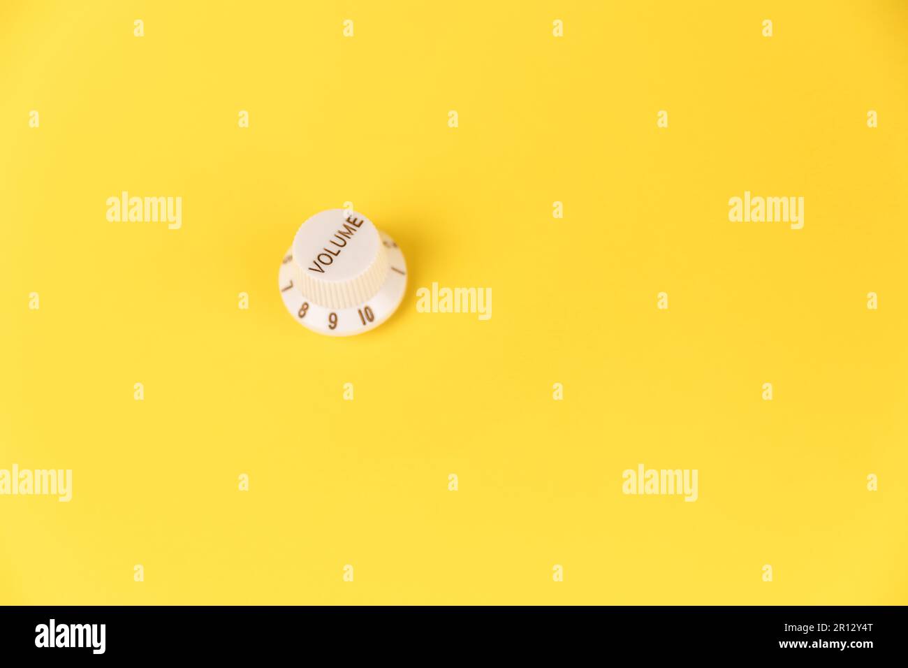 Close up of a black male hand turning volume level Stock Photo - Alamy