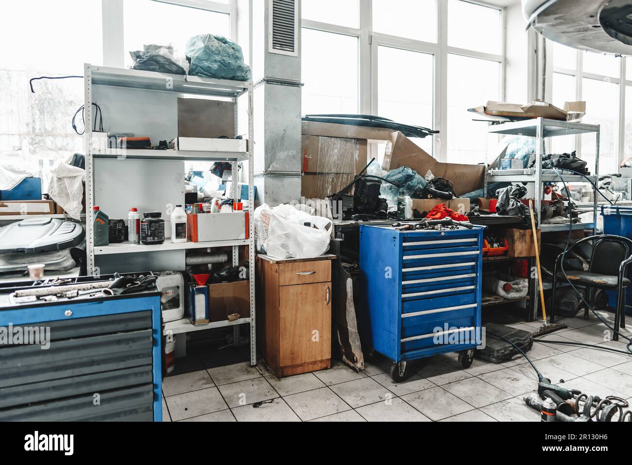Different tools on workbench in car service Stock Photo - Alamy