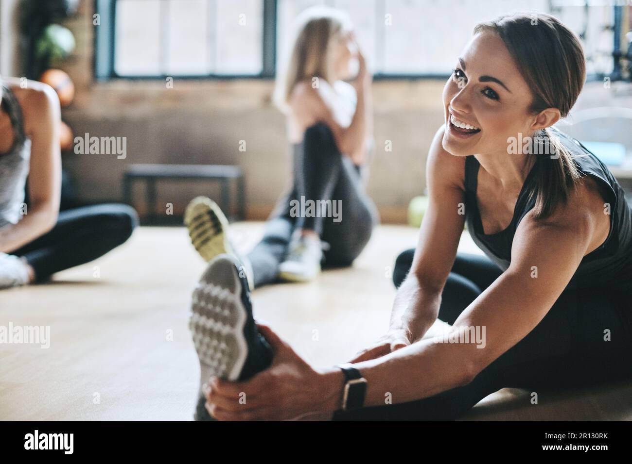 Fitness, gym and women stretching, exercise and workout goal for ...