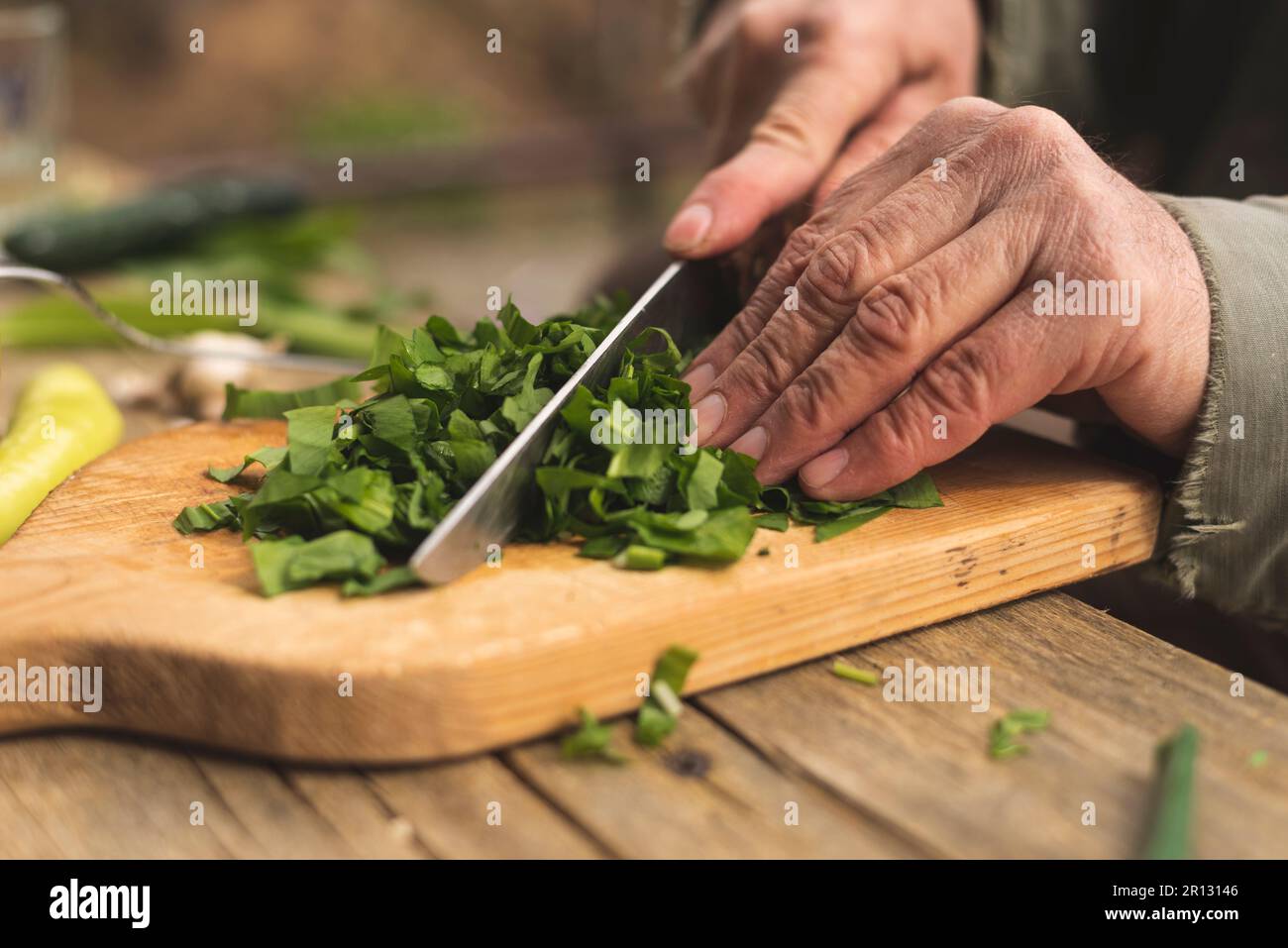 Human hands cutting wild hi-res stock photography and images - Alamy