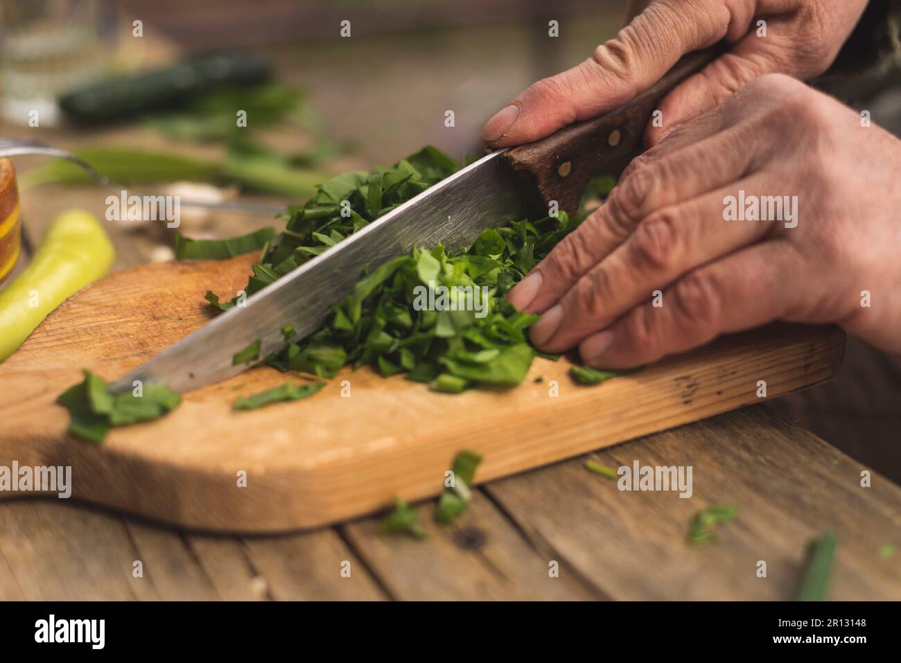 Human hands cutting wild hi-res stock photography and images - Alamy