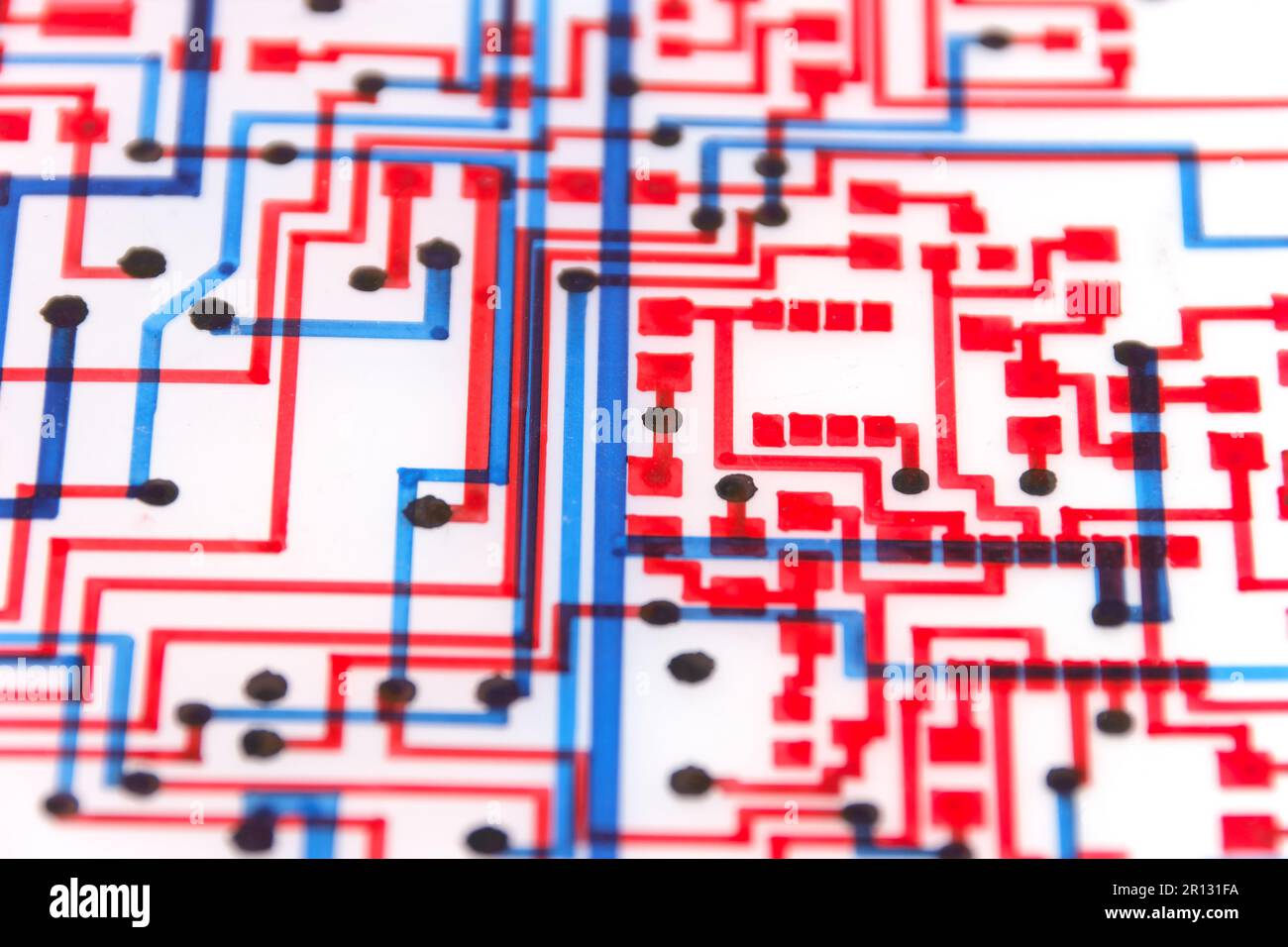 close up of a plotted circuit layout in red and blue for a printed ...