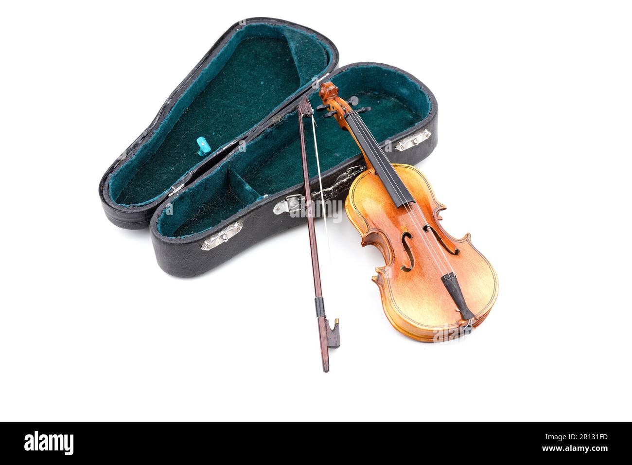 small model of an old used violin with bow isolated on white with real ...