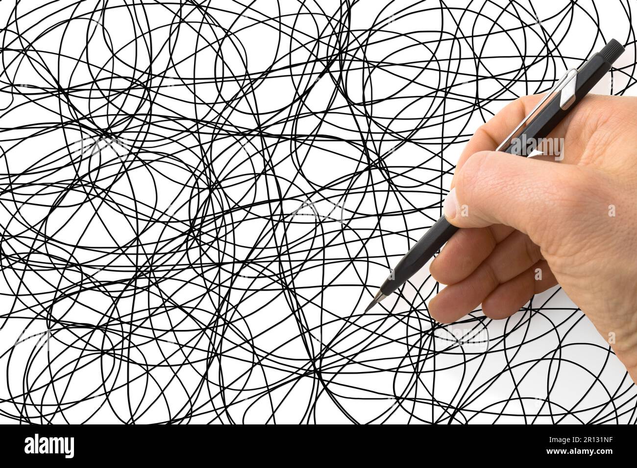 Hand writing scribble on a white paper - concept image Stock Photo - Alamy