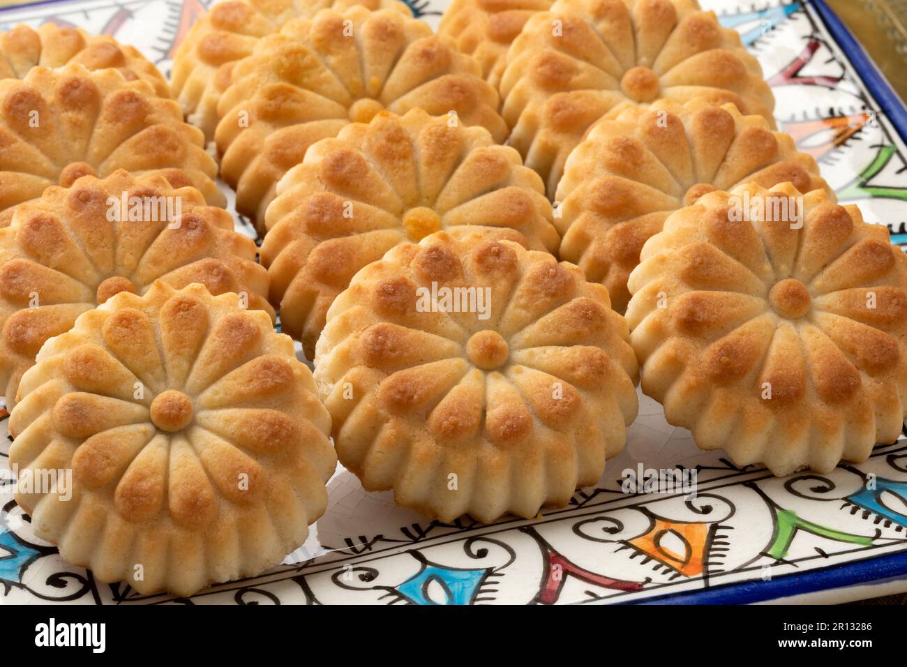 Traditional fresh baked Maamoul cookies stuffed with dates and cardamom ...