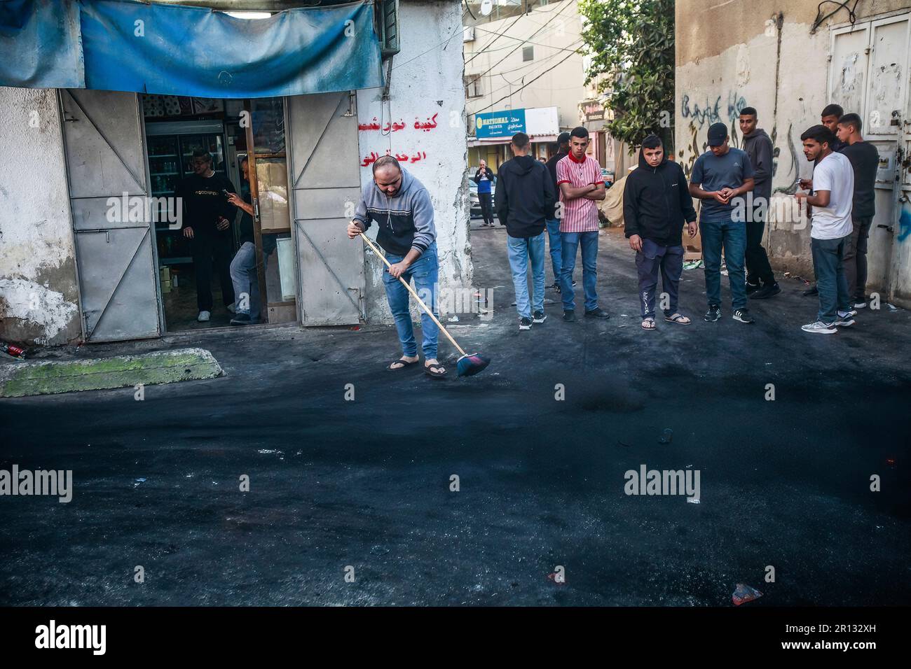 Tulkarm, Palestine, 11/05/2023, Palestinians clean the streets from the ...