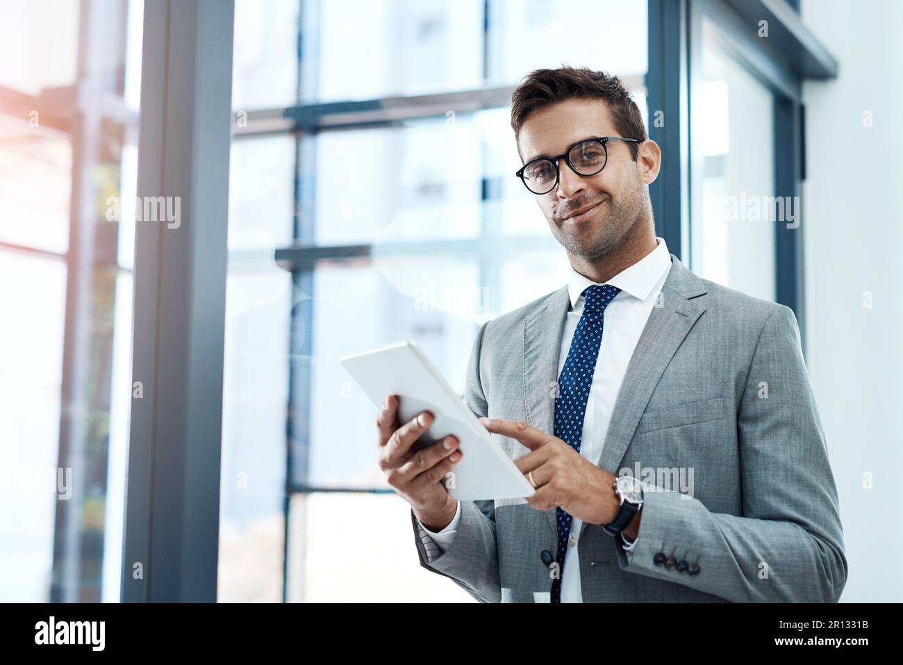 Technology holds the key to success. a professional businessman using a ...