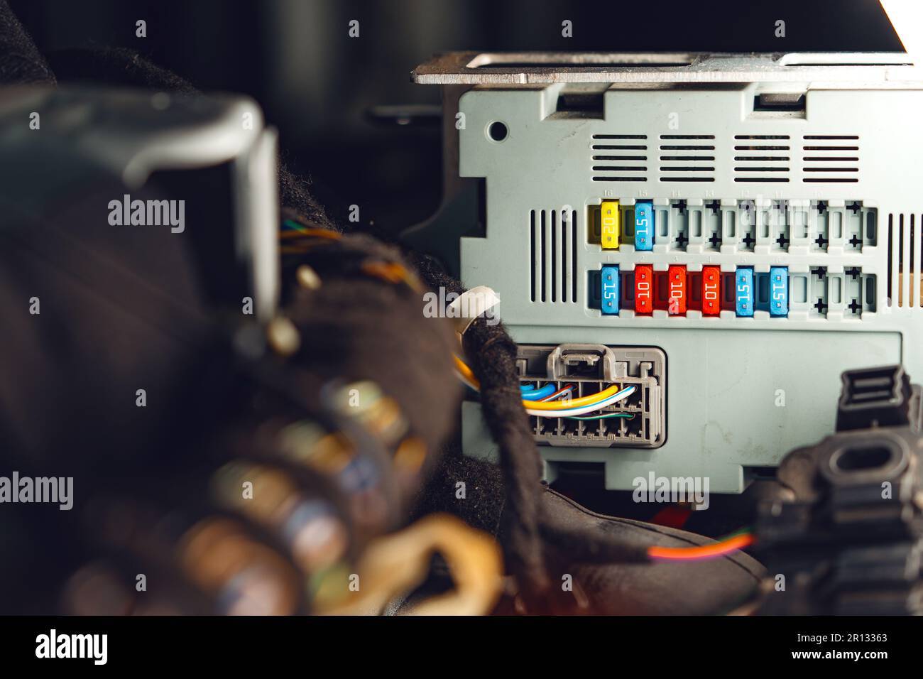 Electric wiring system with colorful wires in the car Stock Photo - Alamy