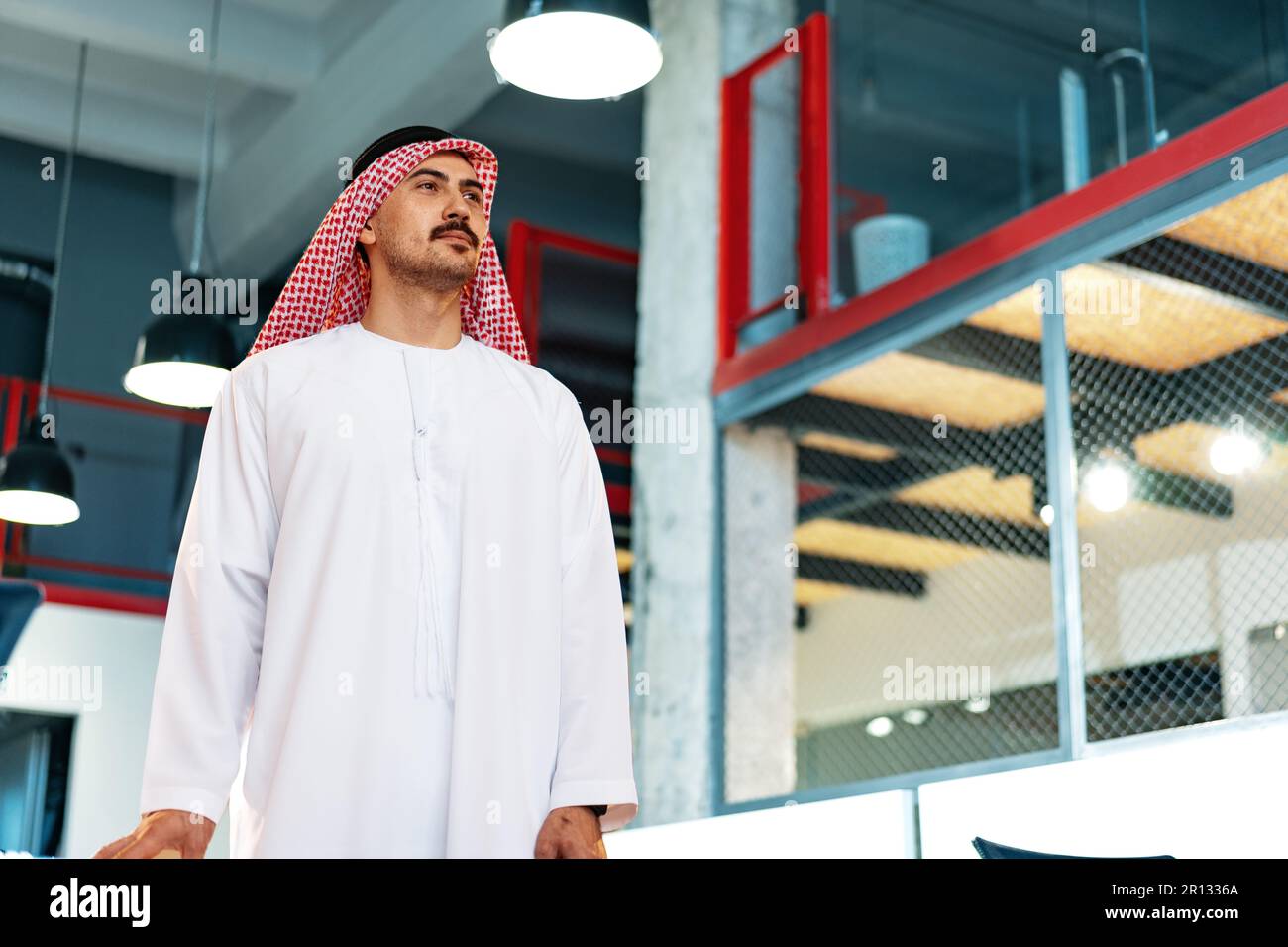Successful muslim businessmen in traditional outfit in his office Stock ...