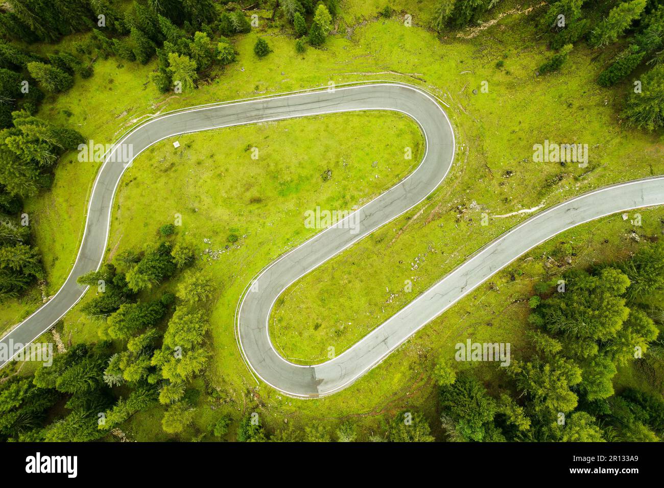 In the Alpine mountains, the scenic and meandering Snake Road driveway ...