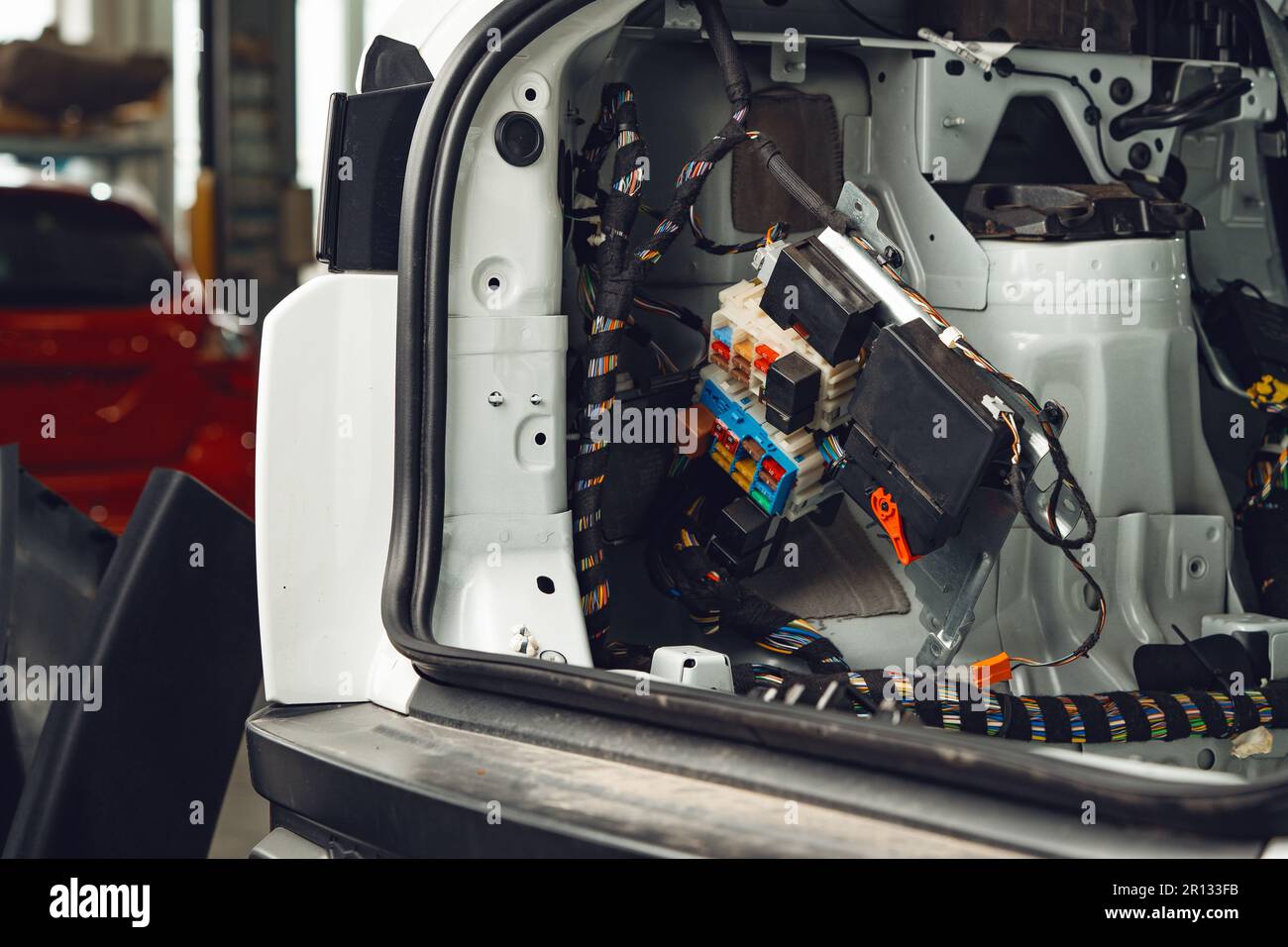 Electric wiring system with colorful wires in the car Stock Photo - Alamy