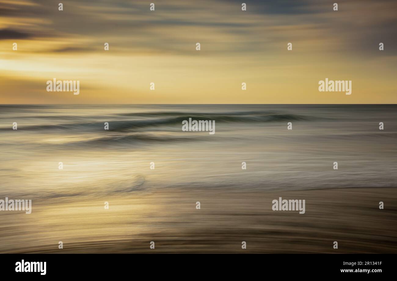 Waves lapping against secluded beach hi-res stock photography and ...
