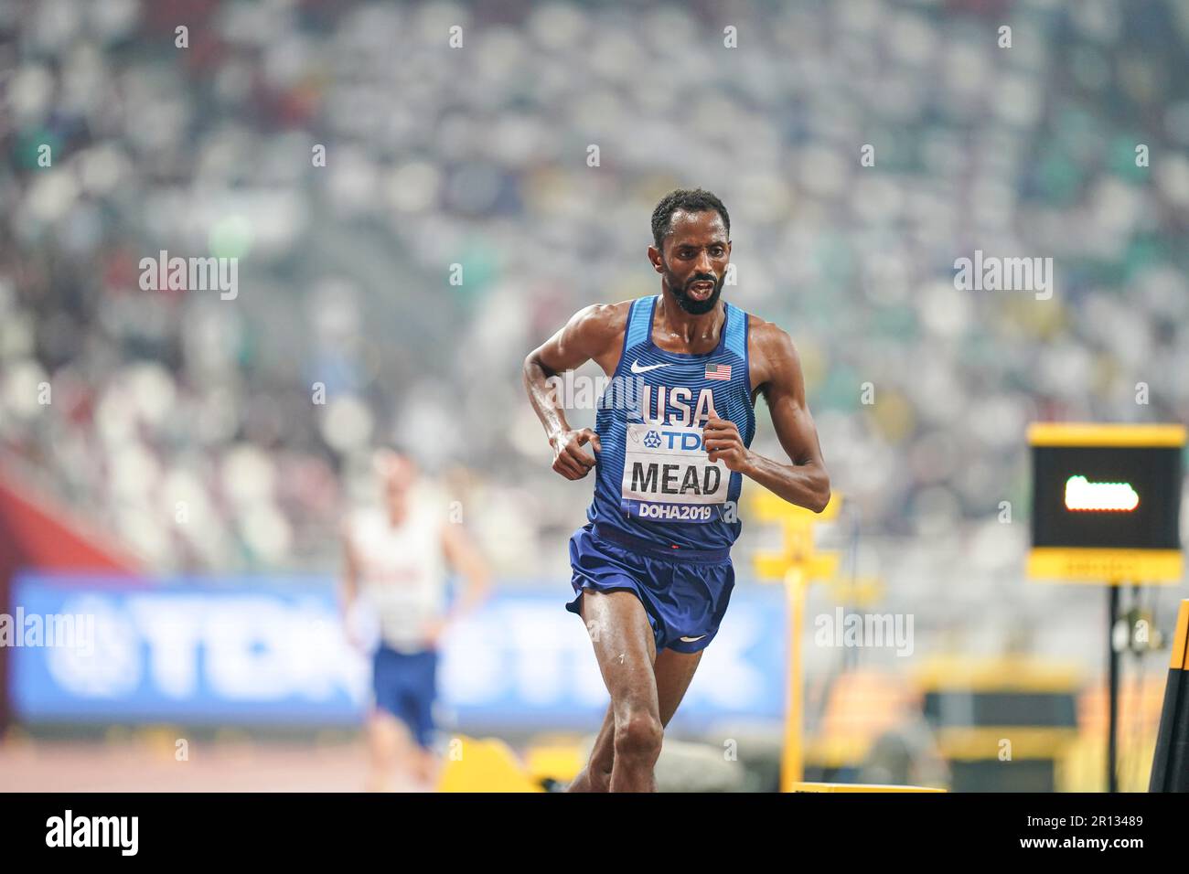 Hassan Mead participating in the 5000 meters at the 2019 World ...