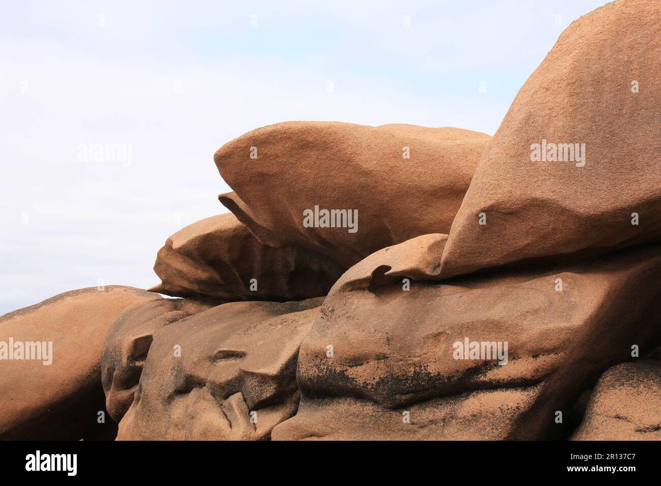 Pink colored granite boulder in Granit Rose, Brittany Stock Photo - Alamy