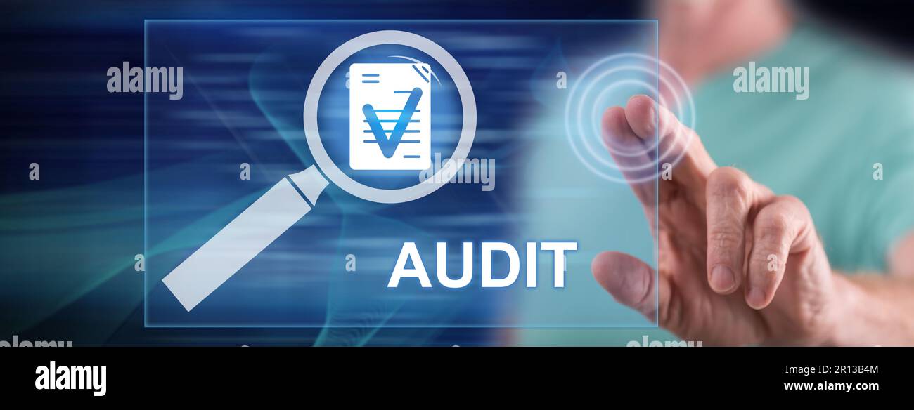 Man touching an audit concept on a touch screen with his finger Stock ...